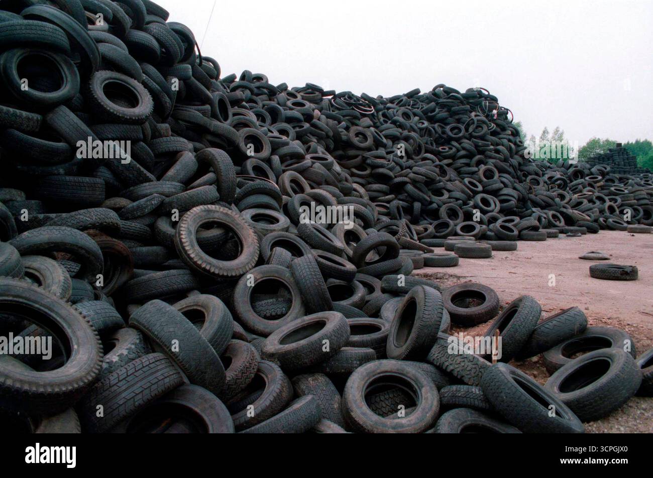 old round car tires in garbage, waste separation and recycling old ...