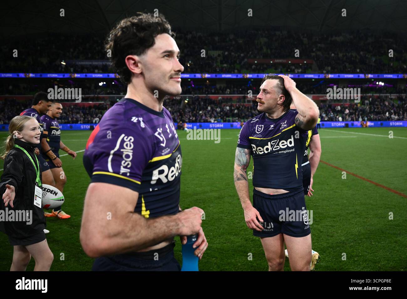 Nick Meaney of the Storm (left) and Cameron Munster of the Storm ...