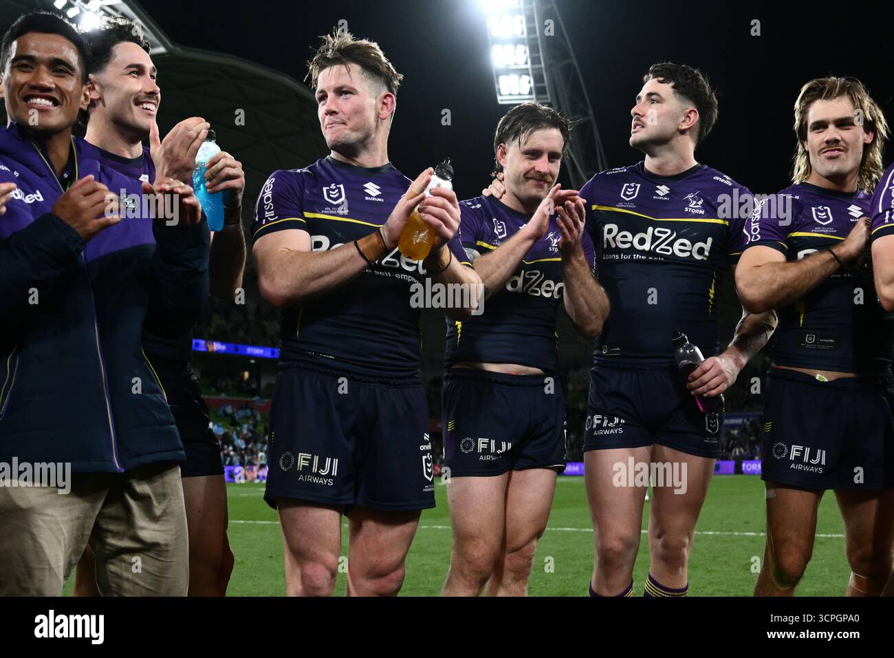 Melbourne Storm players celebrate following the NRL Preliminary Final ...