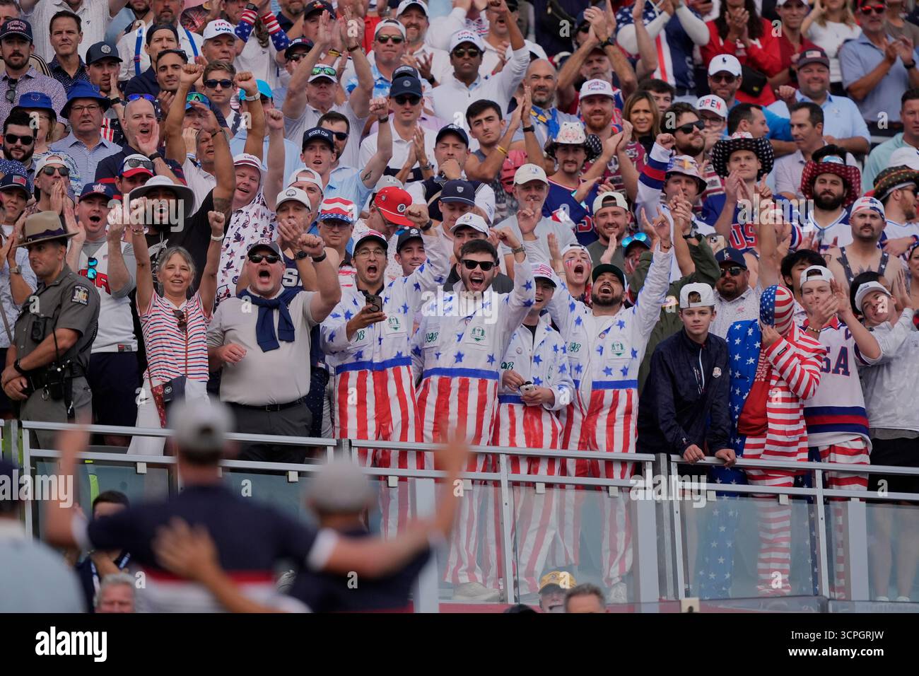 Fans cheer on the first hole at Bethpage Black golf course during the ...