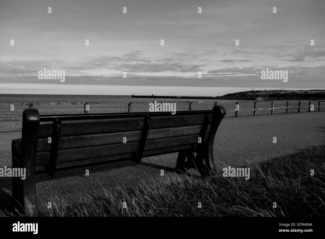 Sea lighthouse bench Black and White Stock Photos & Images - Alamy