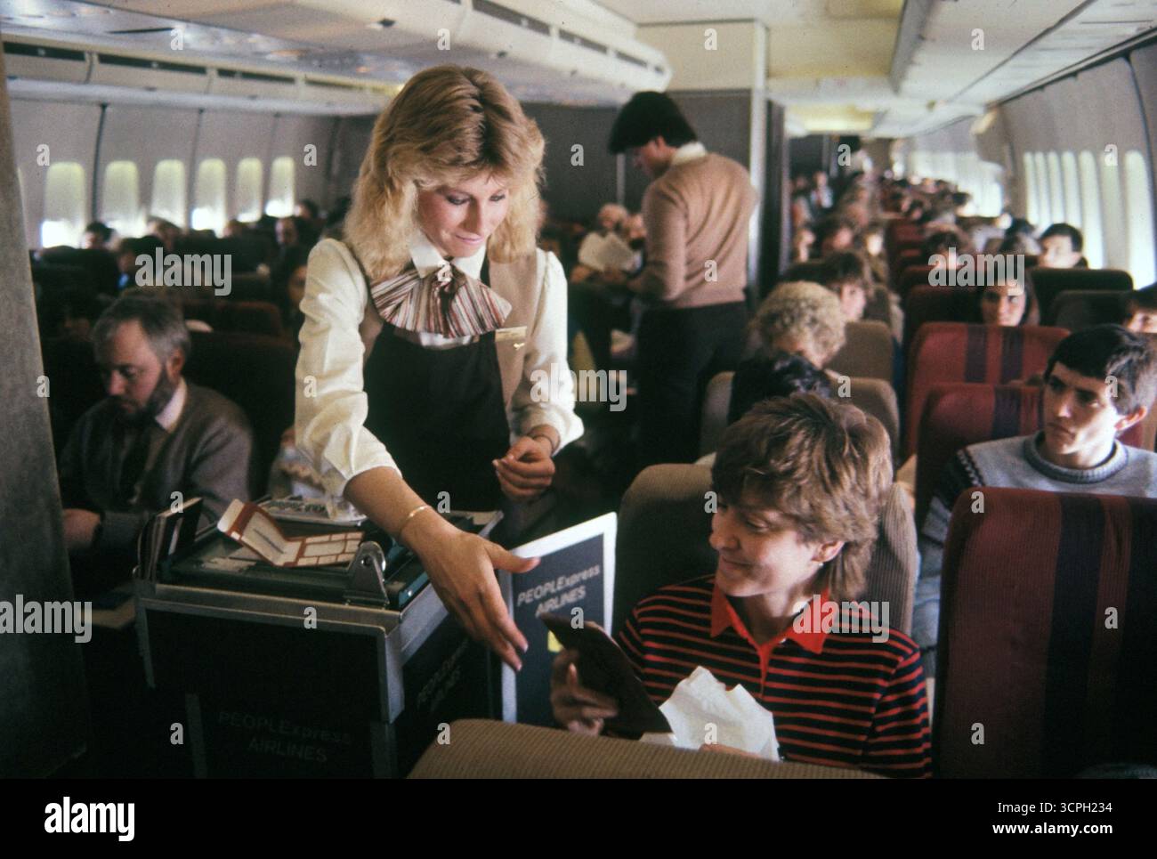 Buying a ticket 1980s air travel. People Express PeoplExpress Airline ...
