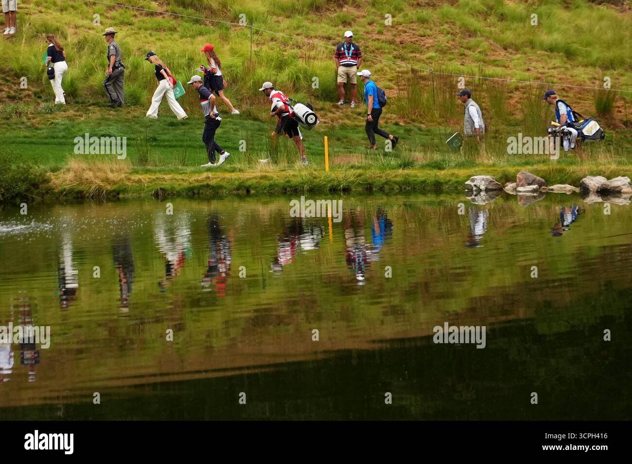 United States' Russell Henley walks on the eighth hole at Bethpage ...