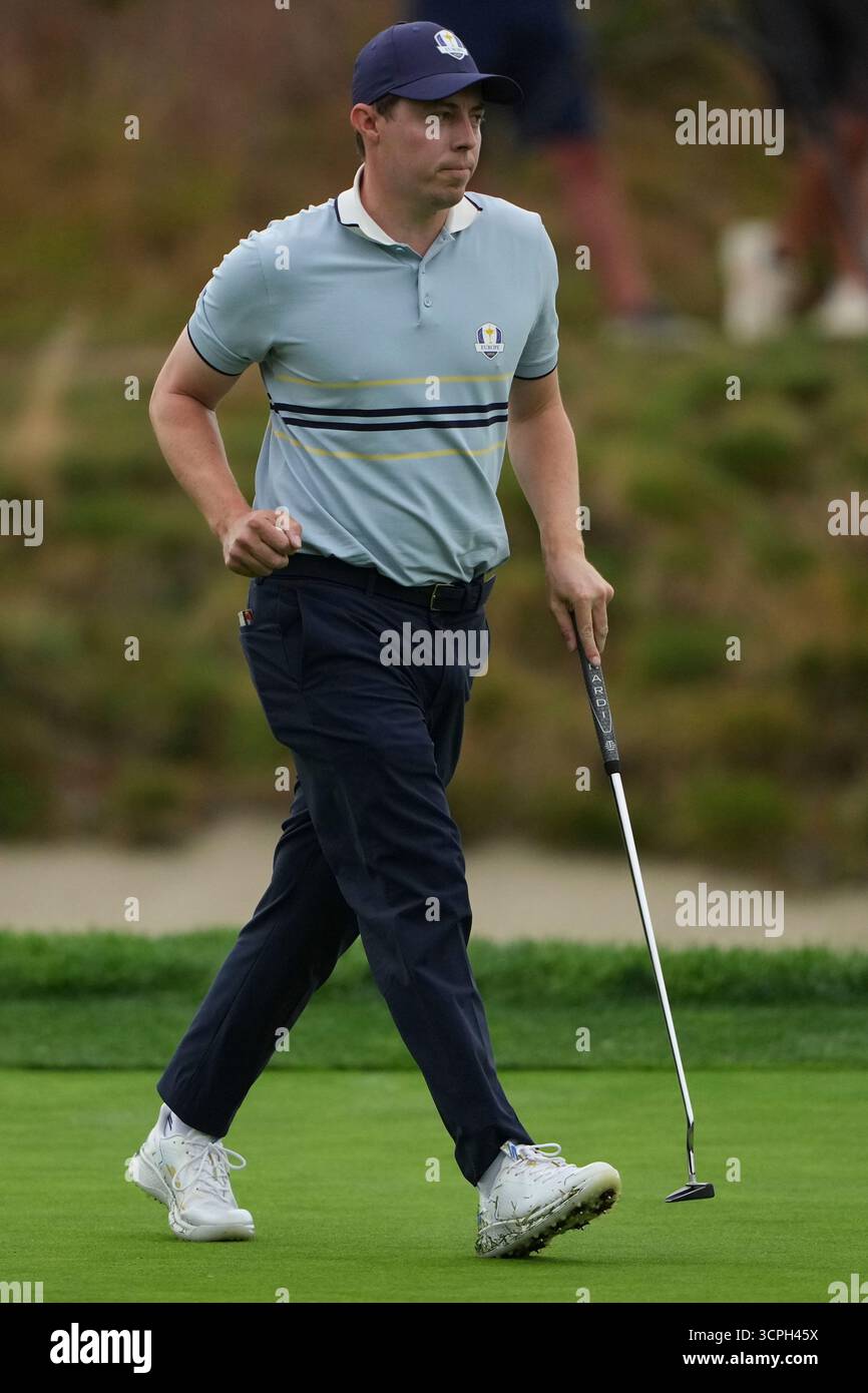 Europe's Matthew Fitzpatrick celebrates after a putt on the sixth hole ...