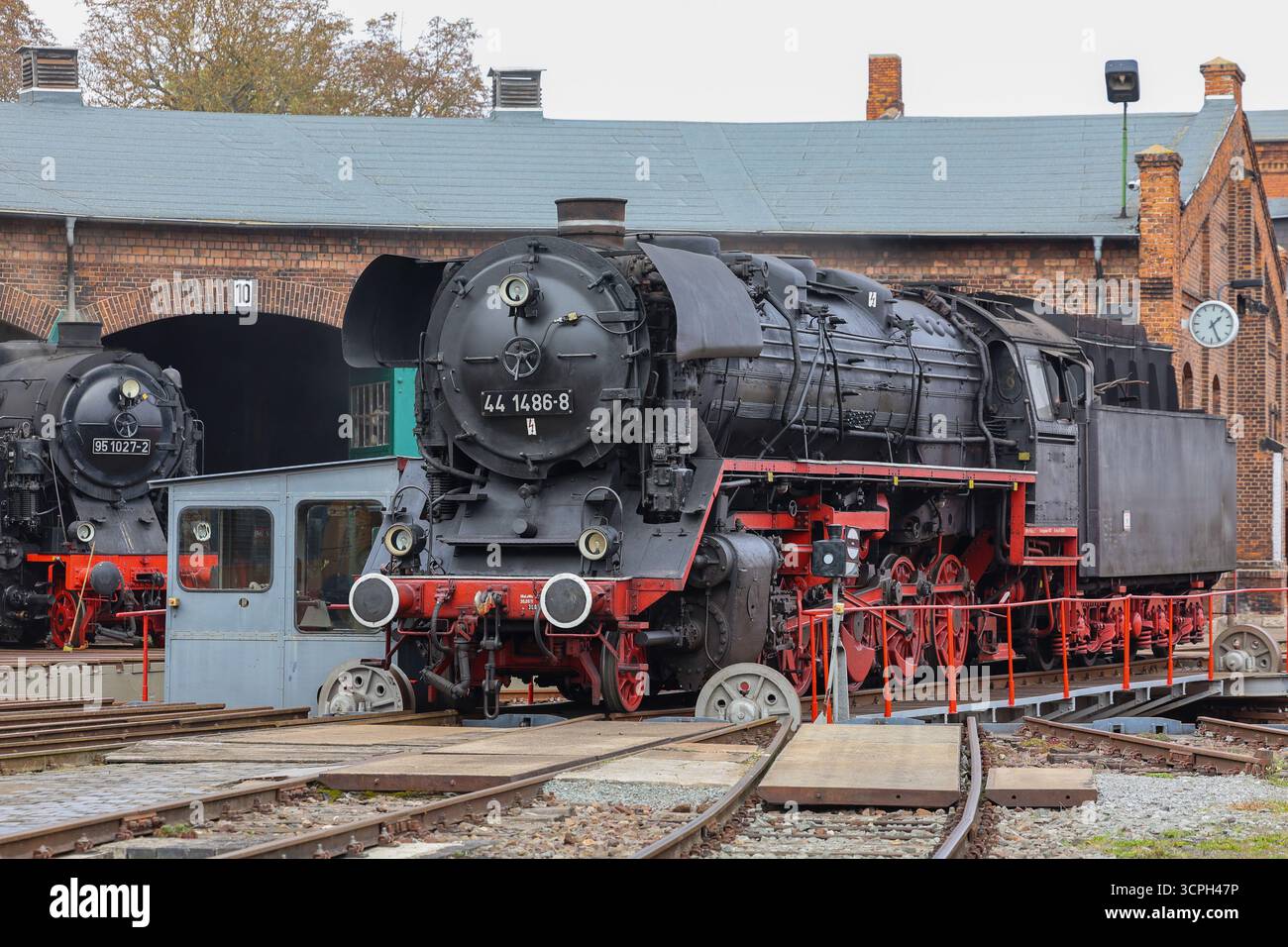 26 September 2025, Saxony-Anhalt, Staßfurt: A class 44 steam locomotive ...