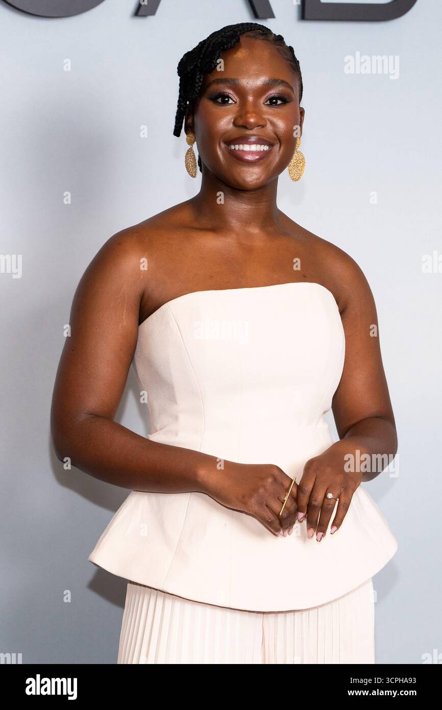 Ayo Owoyemi-Peters poses for photographers upon arrival at the premiere ...