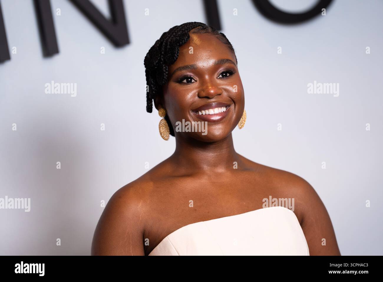 Ayo Owoyemi-Peters poses for photographers upon arrival at the premiere ...