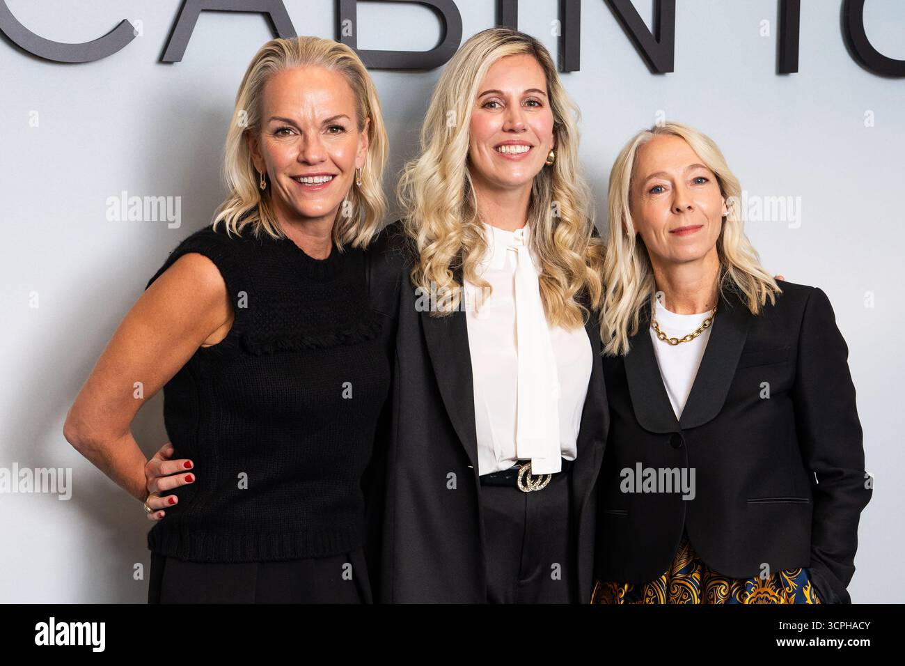 Elisabeth Murdoch, left, Ilda Diffley and Jane Featherstone pose for ...