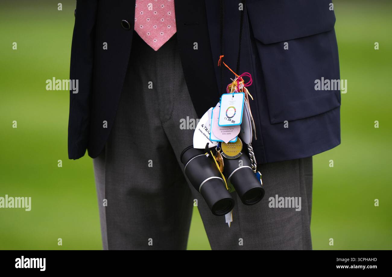 A close up of a racegoer racing tags during Cambridgeshire Friday at ...