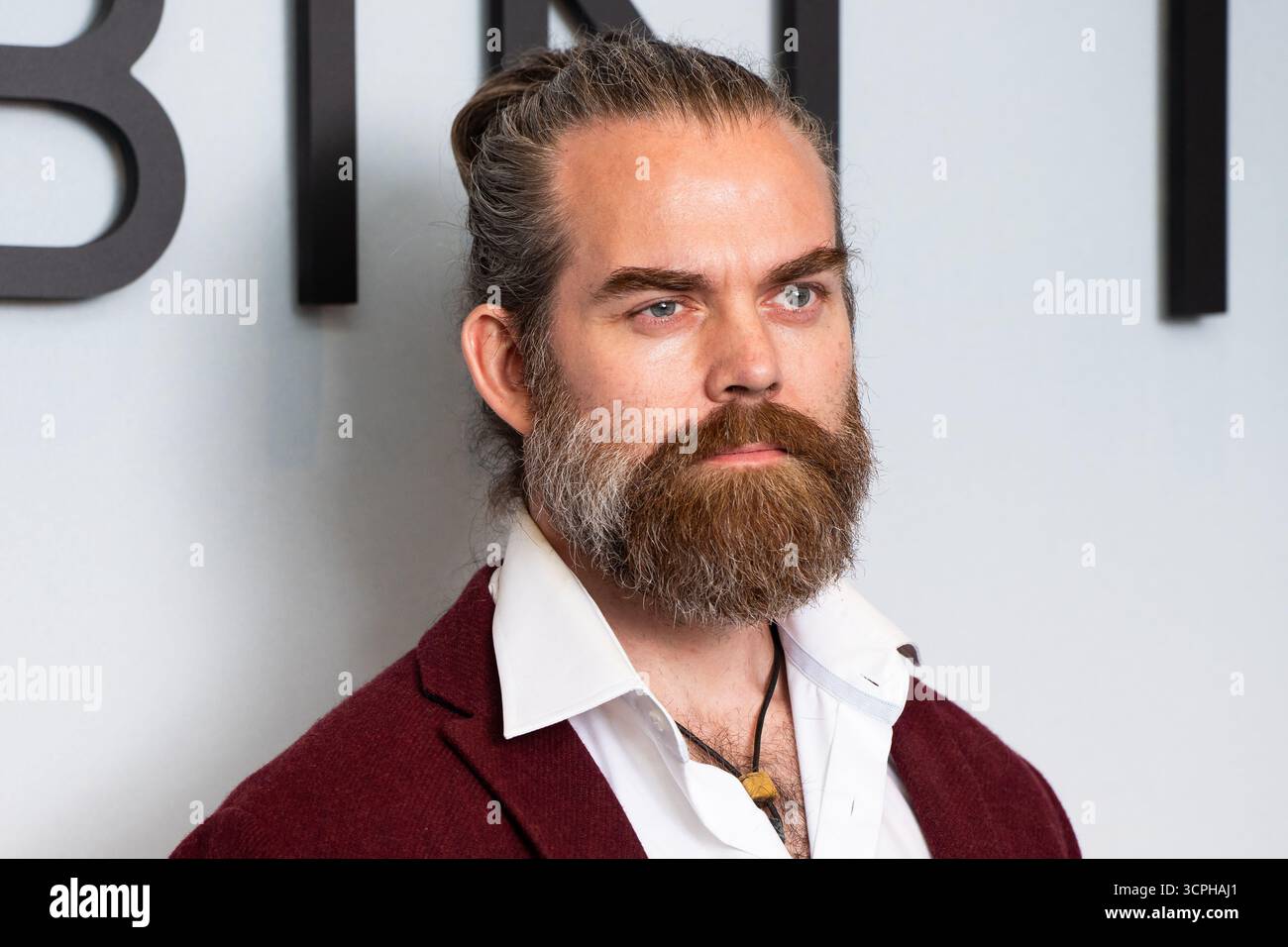 Christopher Rygh poses for photographers upon arrival at the premiere ...