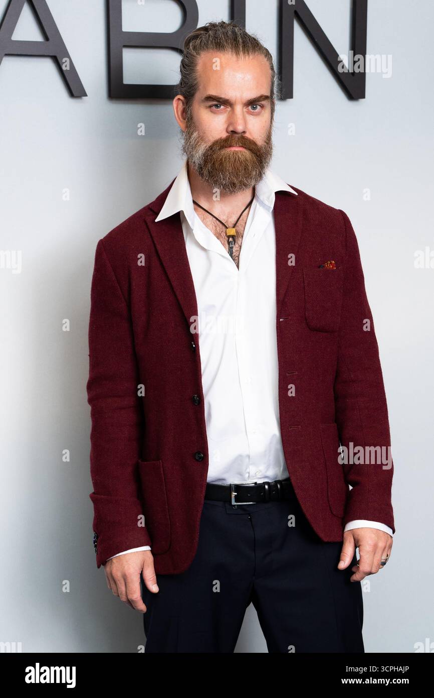 Christopher Rygh poses for photographers upon arrival at the premiere ...