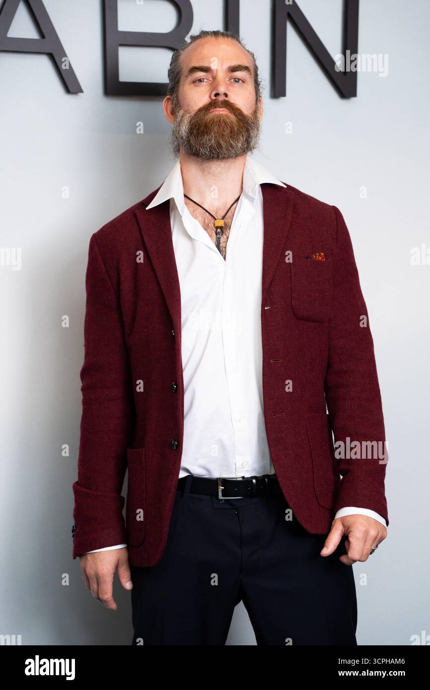 Christopher Rygh poses for photographers upon arrival at the premiere ...
