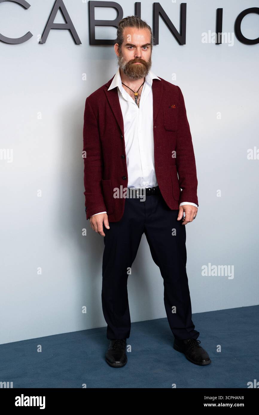 Christopher Rygh poses for photographers upon arrival at the premiere ...