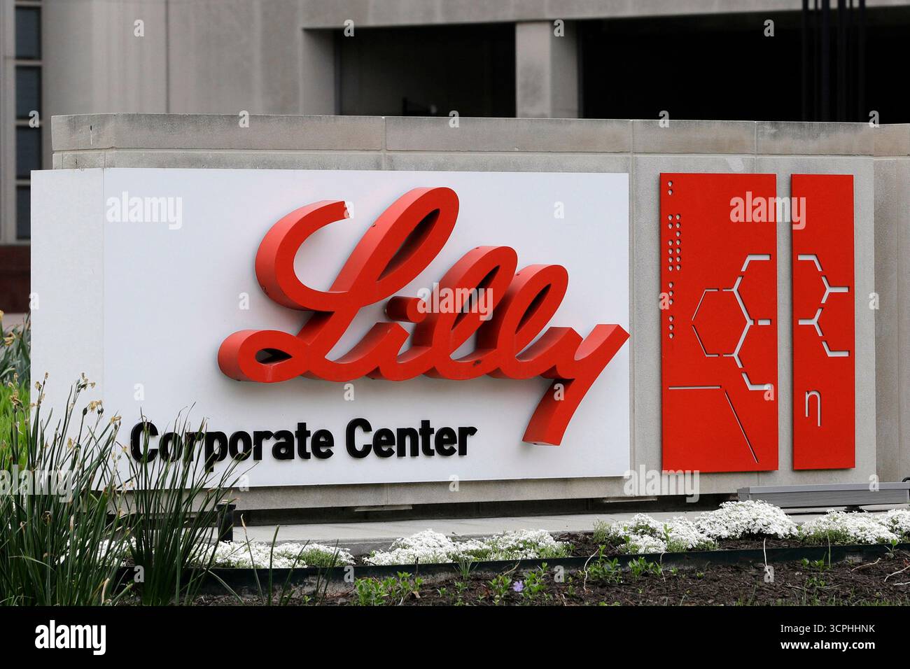FILE - A sign for Eli Lilly & Co. sits outside their corporate ...