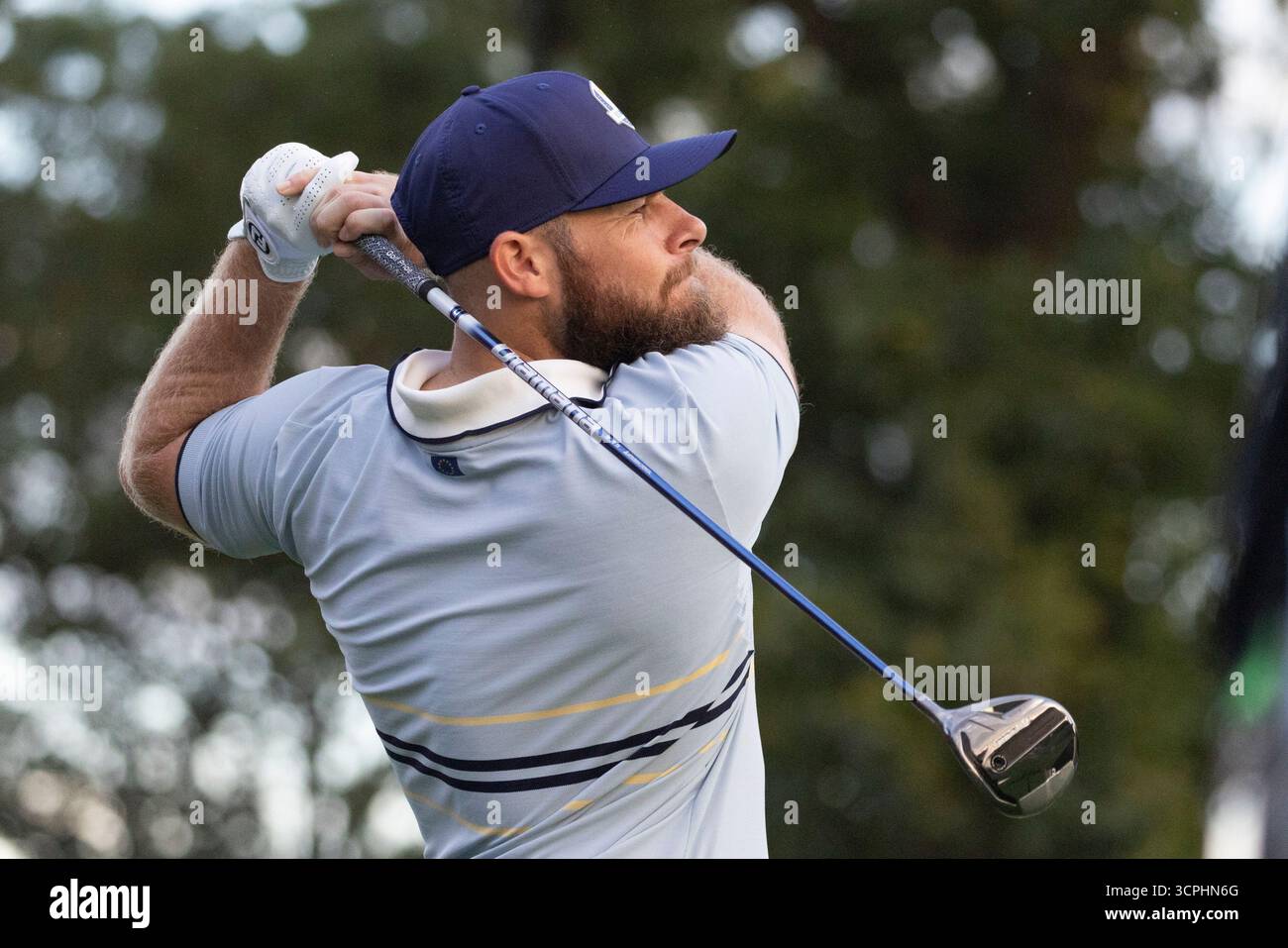 Tyrrell Hatton of team Europe lines hits a ball from the 2nd tee when ...