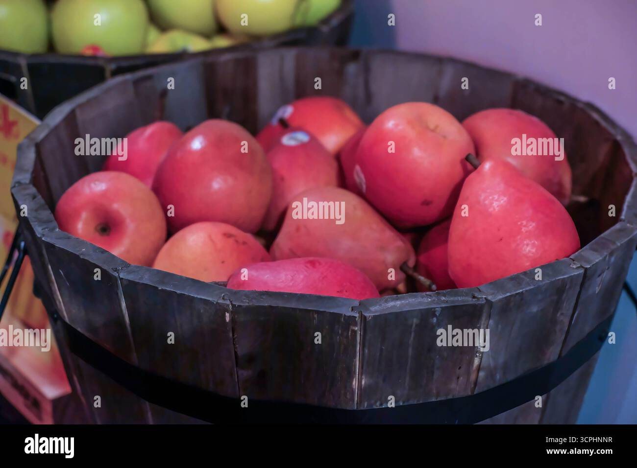 A bucket full of Piqa Boo pears is seen at the Little Food Market expo ...