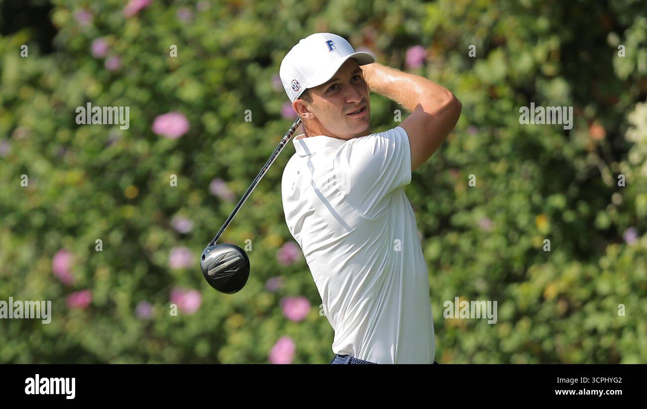 Matthew Kress, of Florida, tees off from hole one during an NCAA golf ...