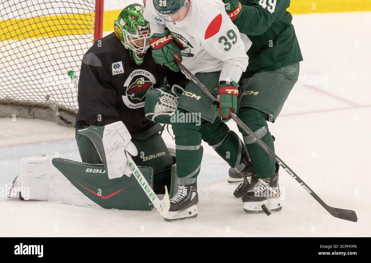 Minnesota Wild goalie Samuel Hlavaj (35) defends the net during NHL ...