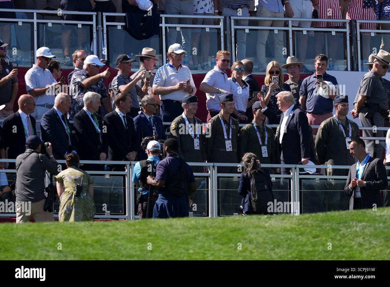 President Donald Trump arrives on the first tee at Bethpage Black golf ...