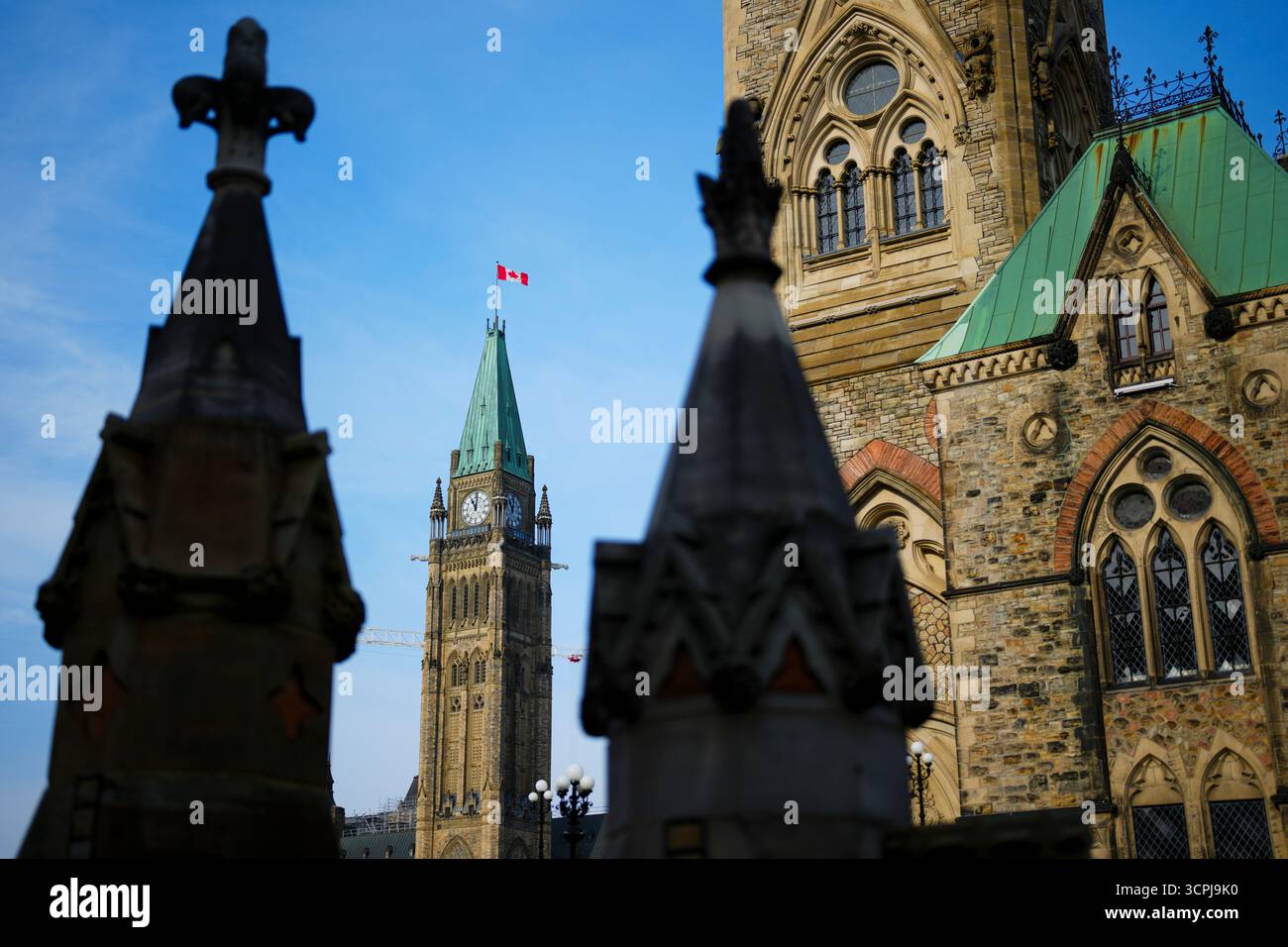 The Canadian flag flies atop the Peace Tower on Parliament Hill in ...