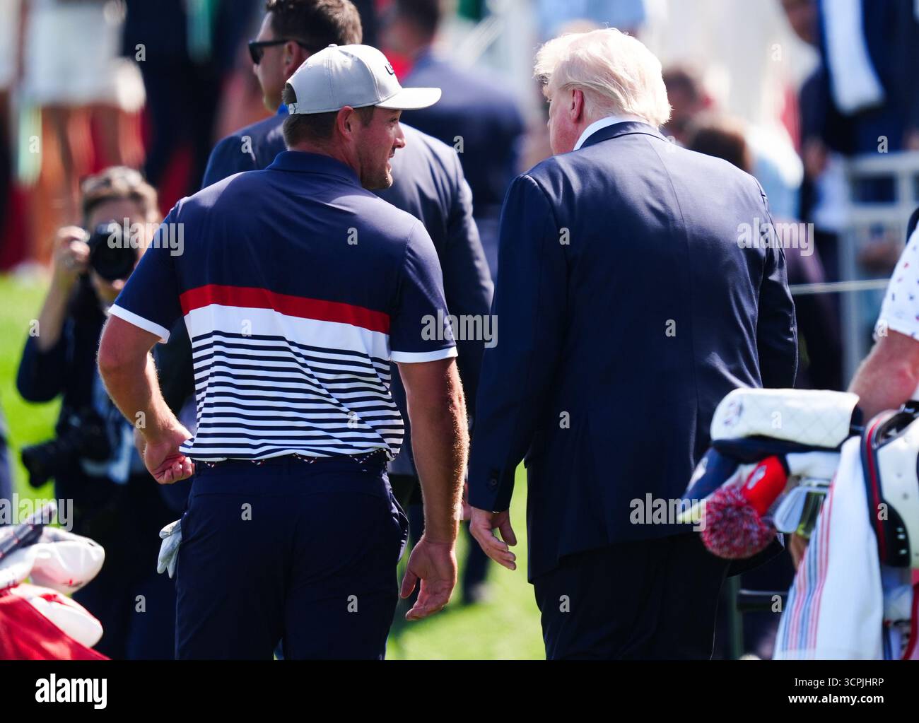 US President Donald Trump with Bryson DeChambeau on day one of the 2025 ...