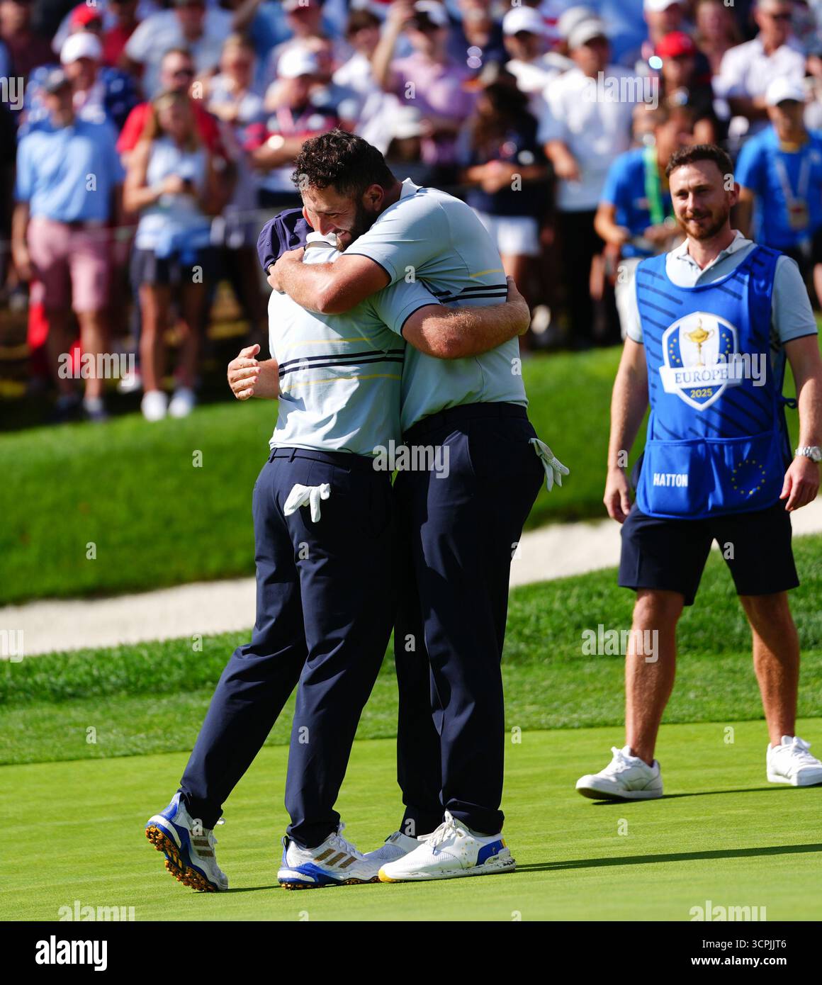 Jon Rahm and Tyrrell Hatton of Team Europe celebrate winning their ...