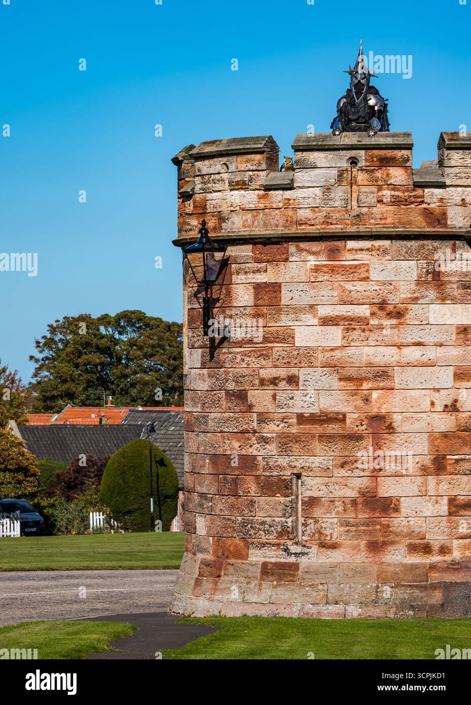 A knight scarecrow on castle turret, Dirleton, East Lothian, Scotland ...