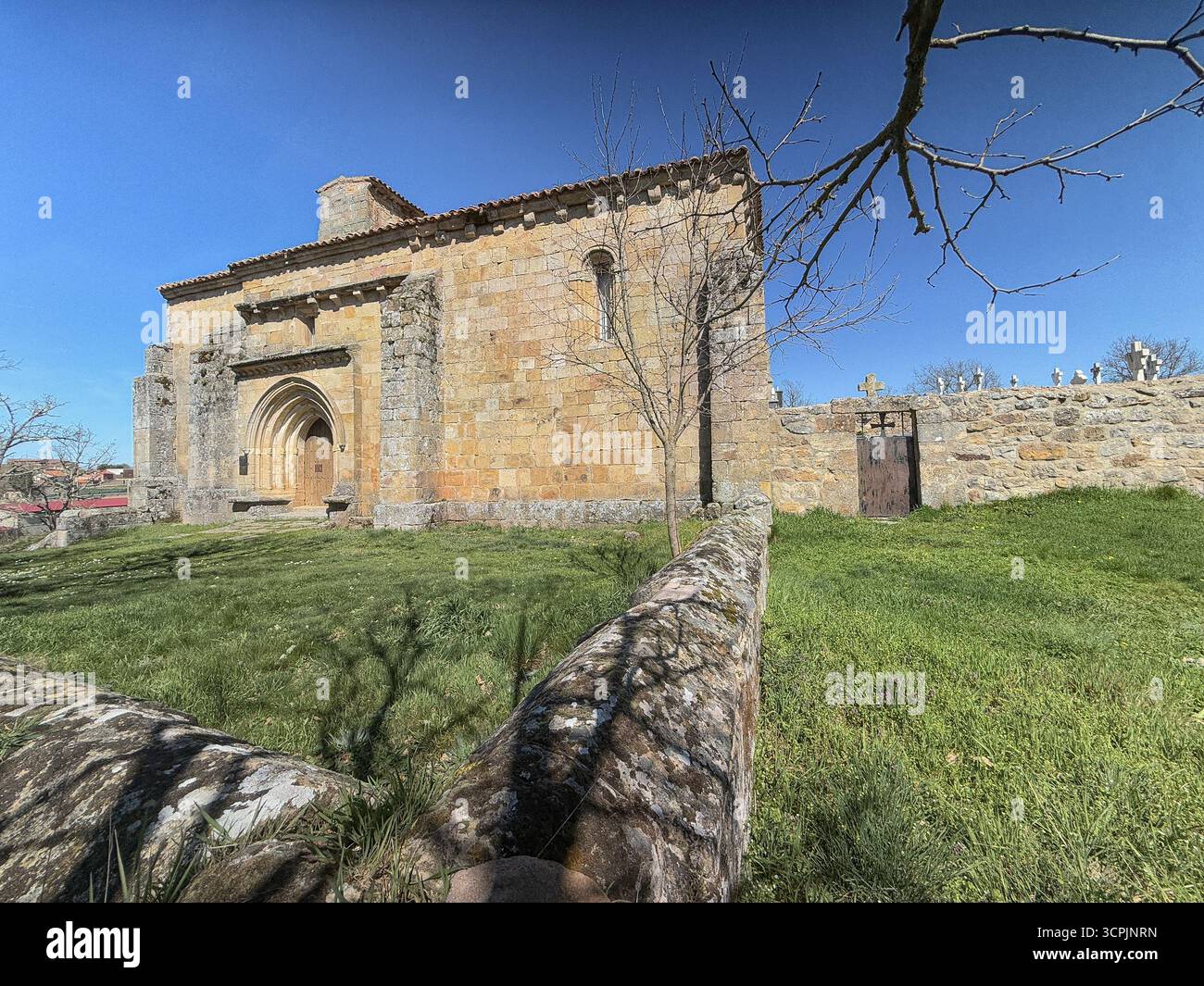 Romanesque stone church in Matamorisca with arched portal and walled ...