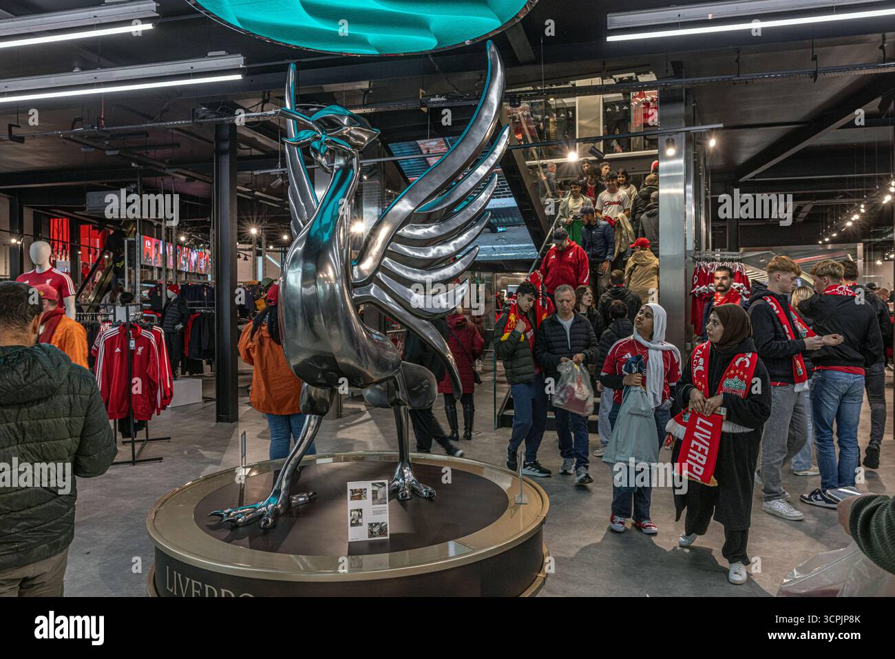 Liverpool fc supporters browses the official Liverpool FC retail store, the 'Fan Store', at ...