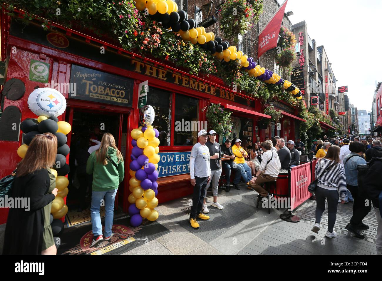 Dublin, Ireland - 26th September 2025 - Pittsburgh Steelers fans in Temple Bar during the build ...