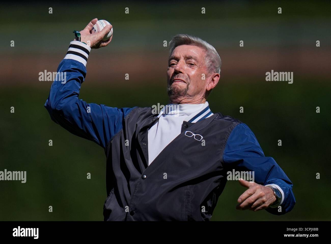 American actor and stand-up comedian Tom Dreesen throws out a ...