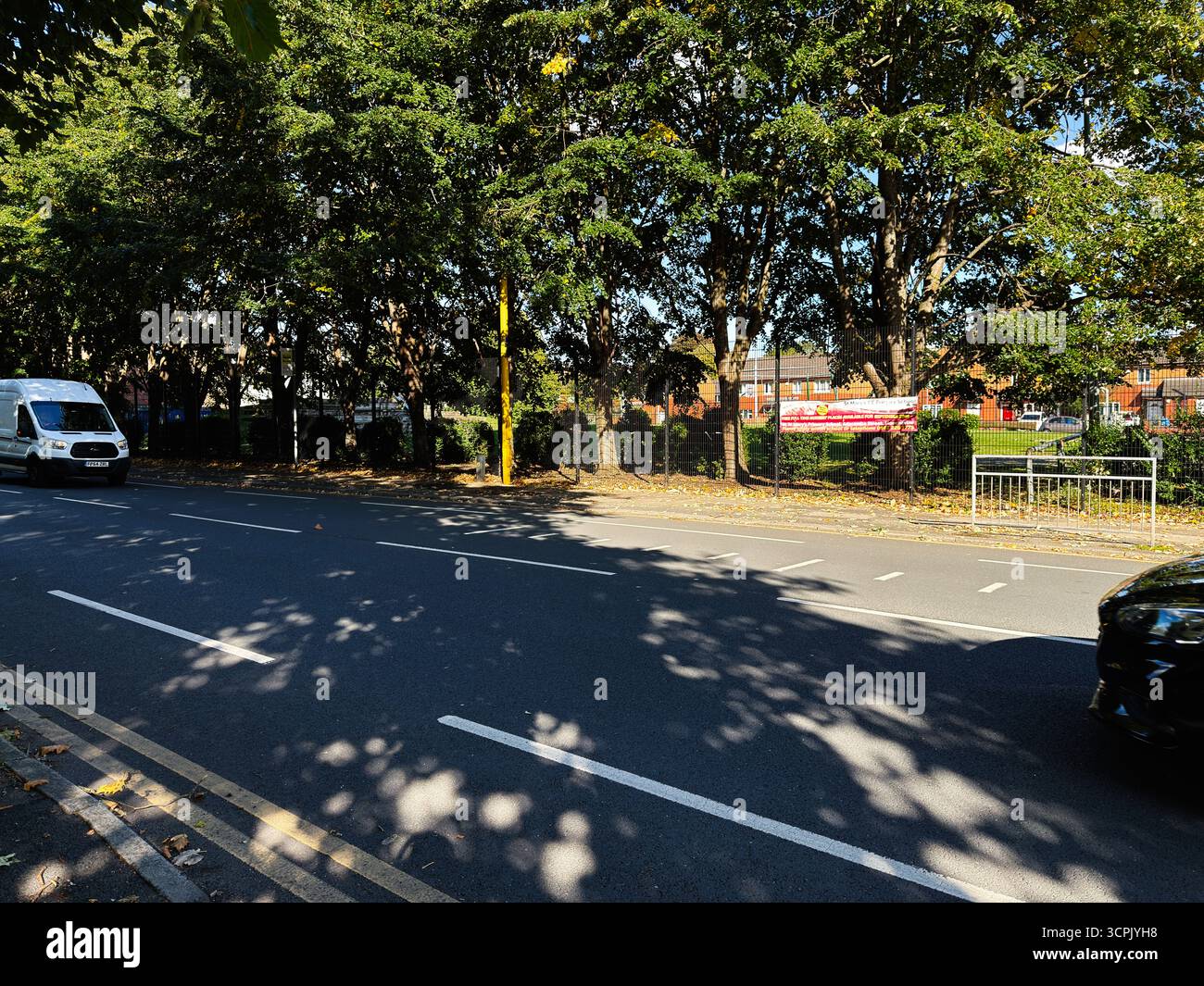 Manchester, UK - September 23, 2025: Shaded city street in Manchester ...