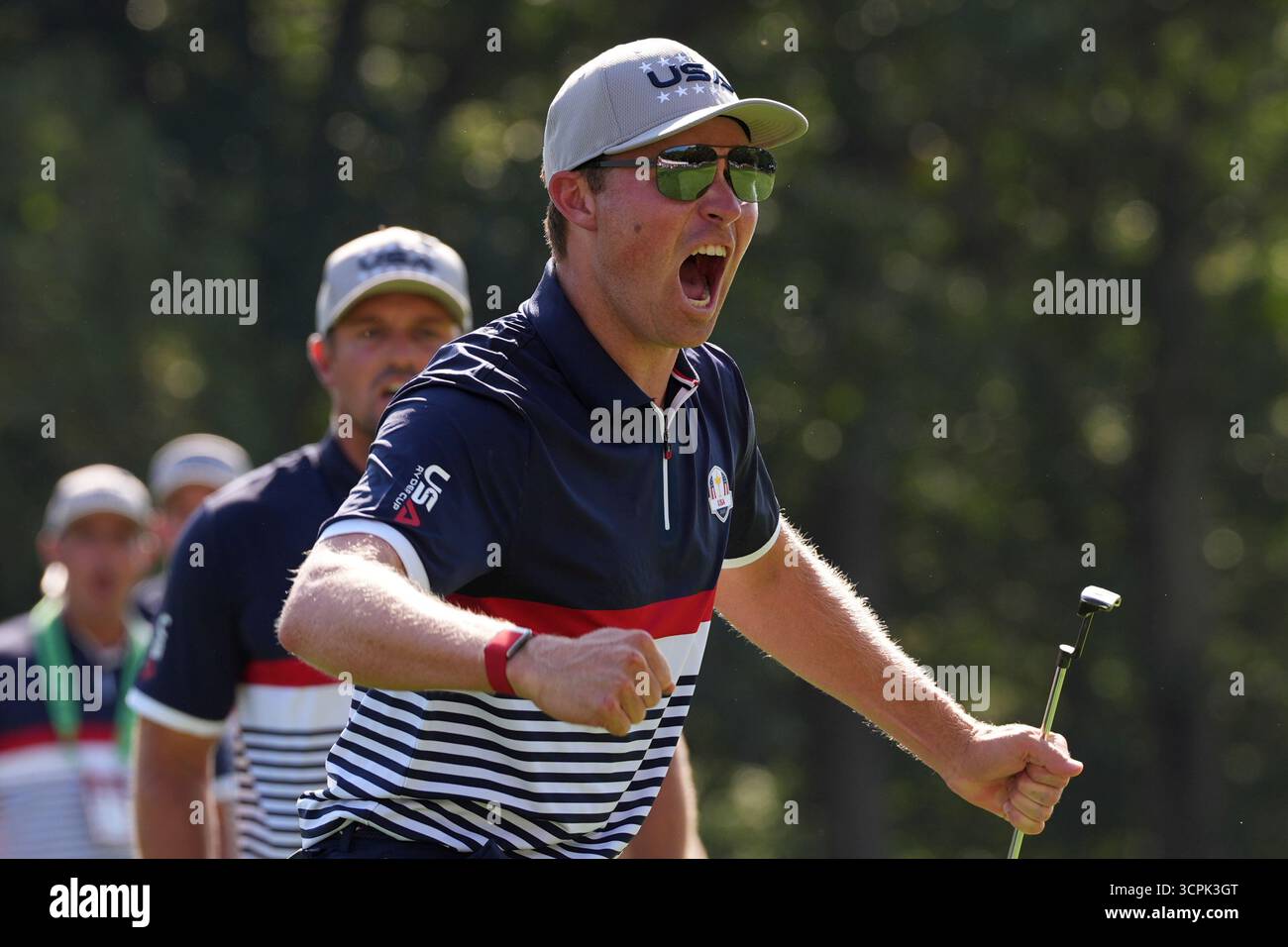 United States' Ben Griffin celebrates after a birdie with Bryson ...