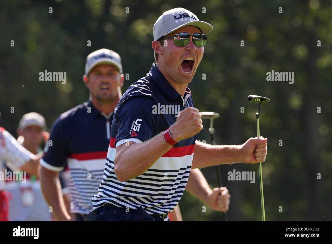 United States' Ben Griffin celebrates after a birdie with Bryson ...