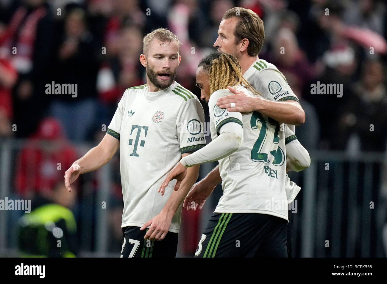 Bayern's Harry Kane, right, celebrates after scoring his side's second ...
