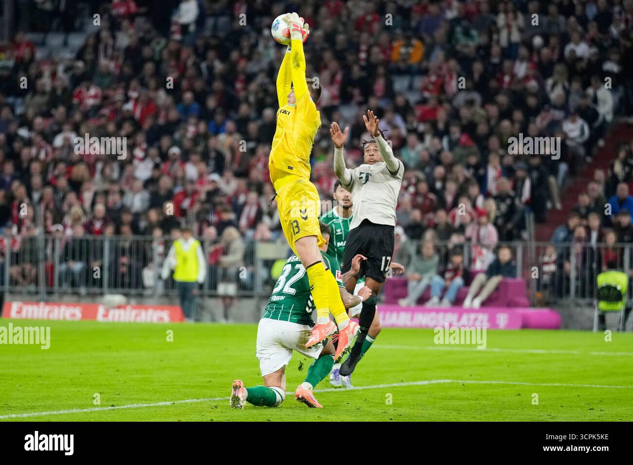 Bremen's goalkeeper Karl Hein makes a save during the Bundesliga soccer ...