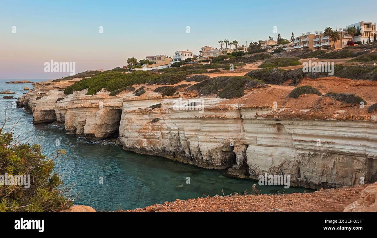 Sea caves, cliffs and arches landscape in Cyprus. White stones cave ...