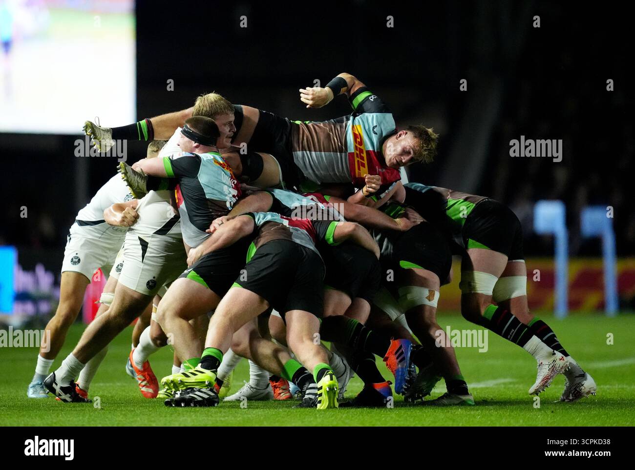 Harlequins' Zach Carr (top) is lifted off his feet during a maul during ...
