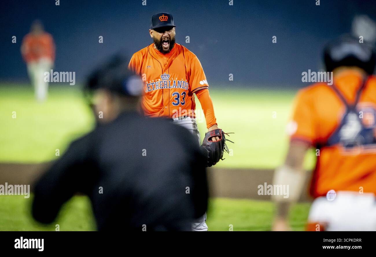 ROTTERDAM - Baseball players celebrate the Netherlands in action ...