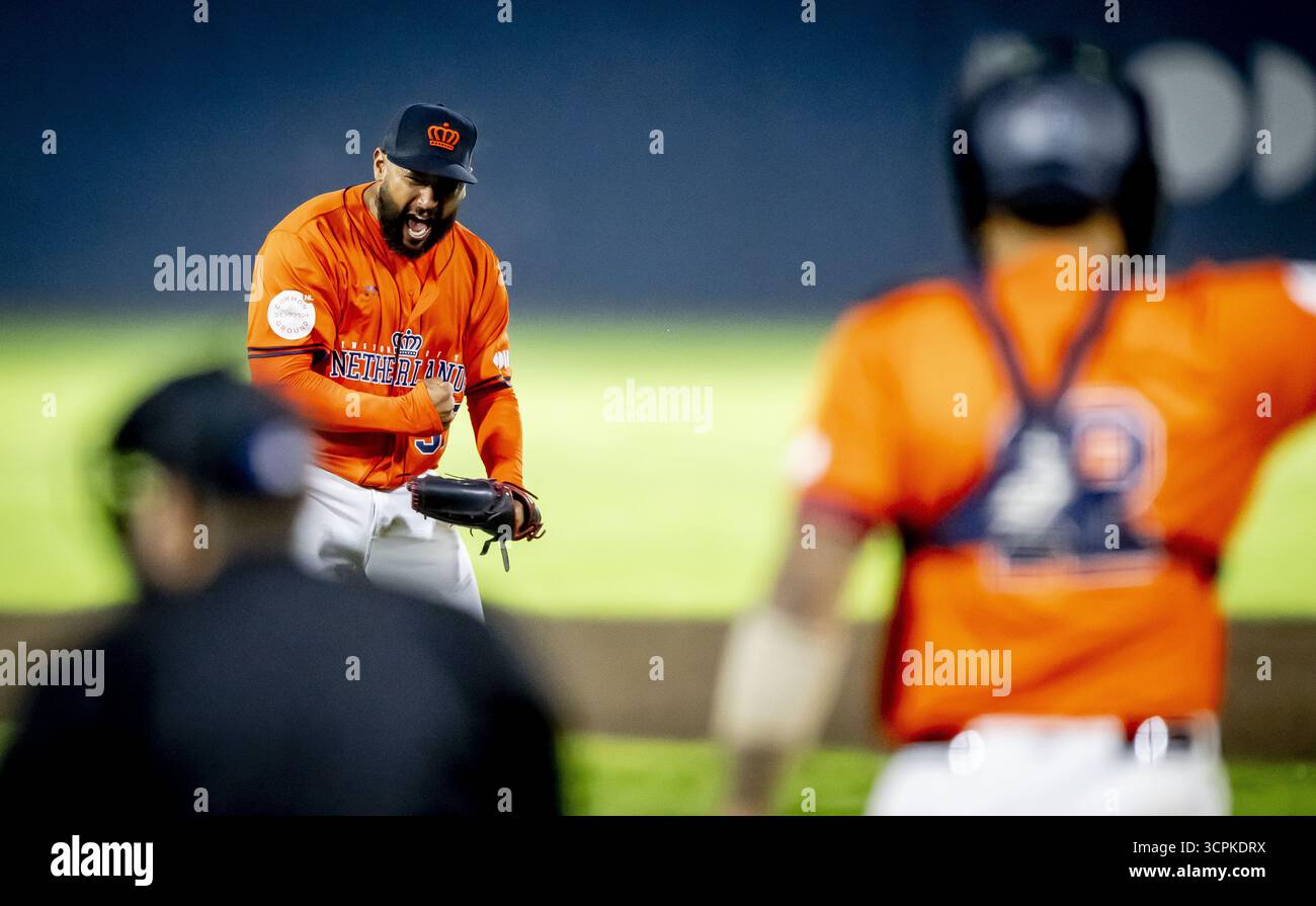 ROTTERDAM - Baseball players celebrate the Netherlands in action ...