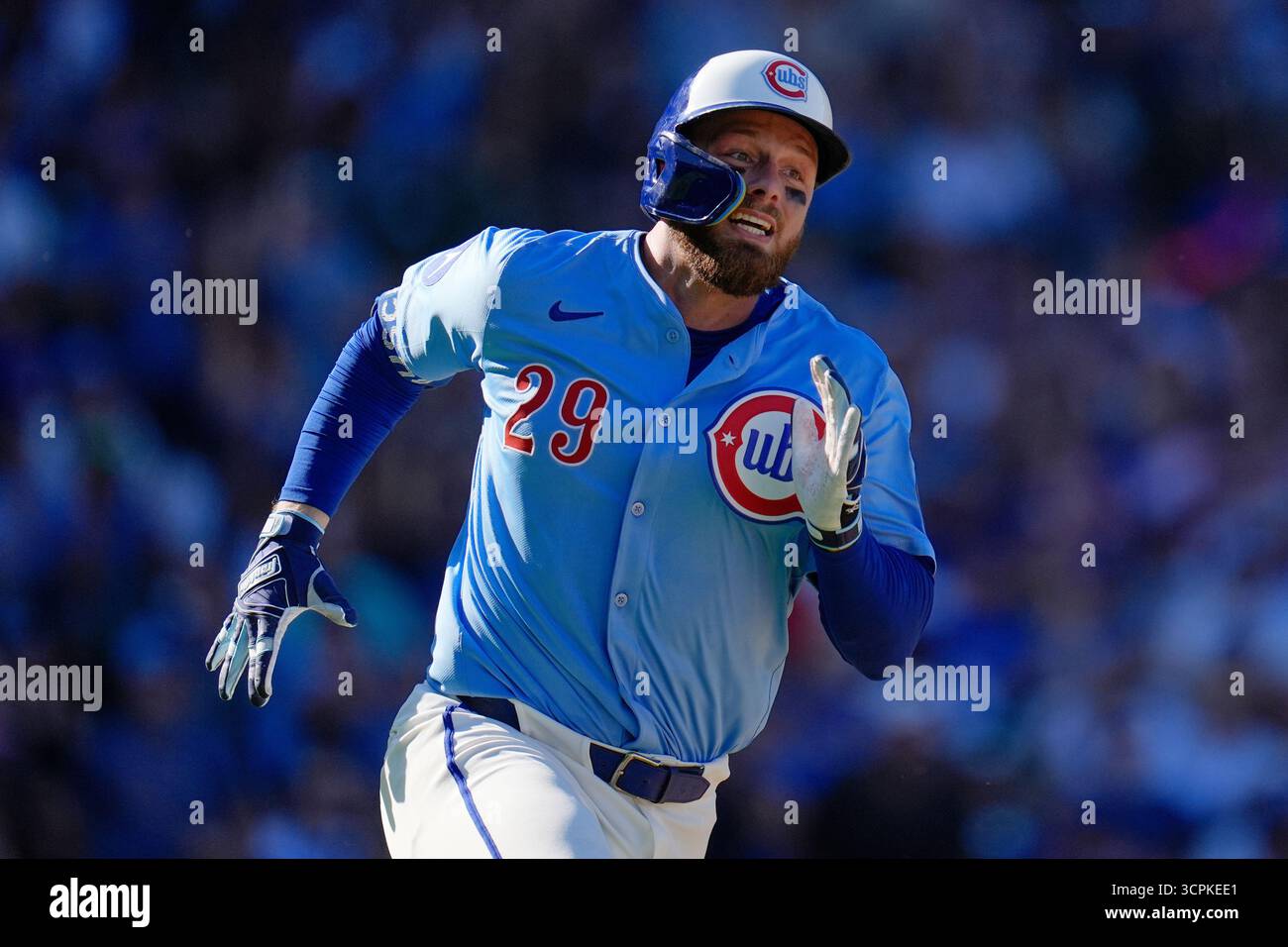 Chicago Cubs' Michael Busch (29) runs the bases after hitting a double ...