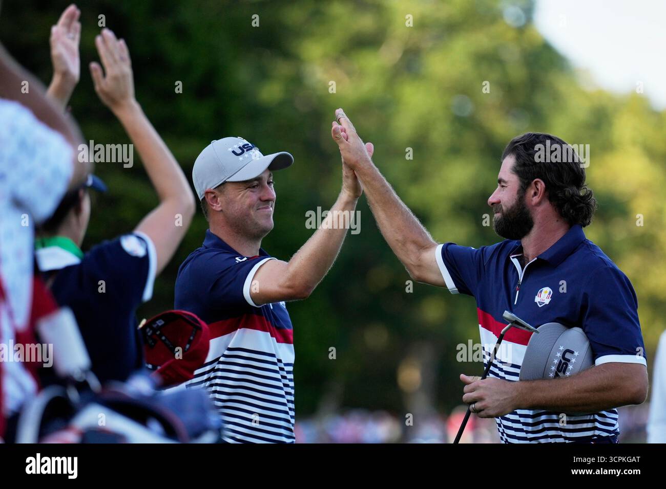 United States' Justin Thomas and Cameron Young celebrates after their ...