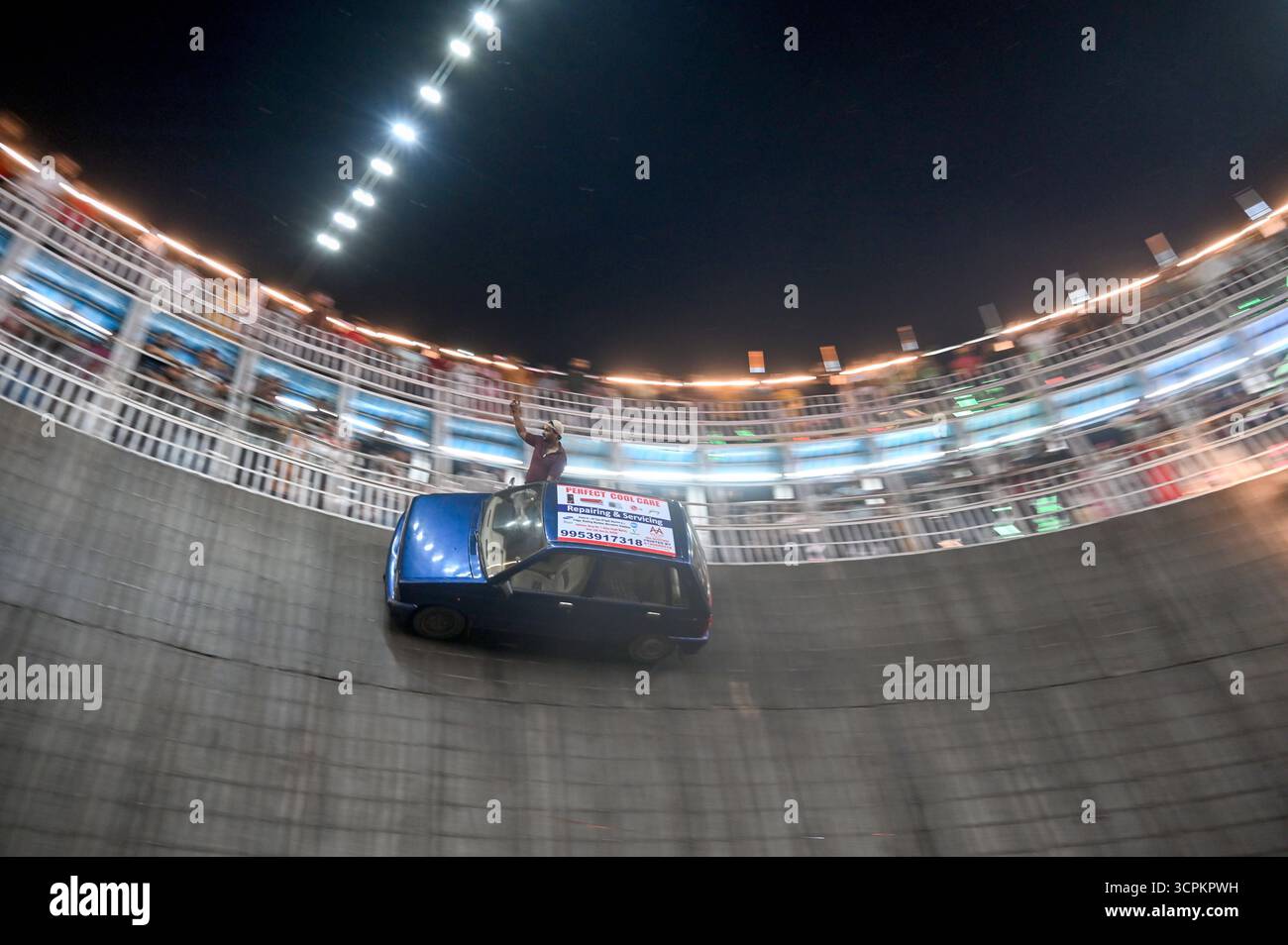 NOIDA, INDIA - SEPTEMBER 25: Carriders perform a stunt show on a ...