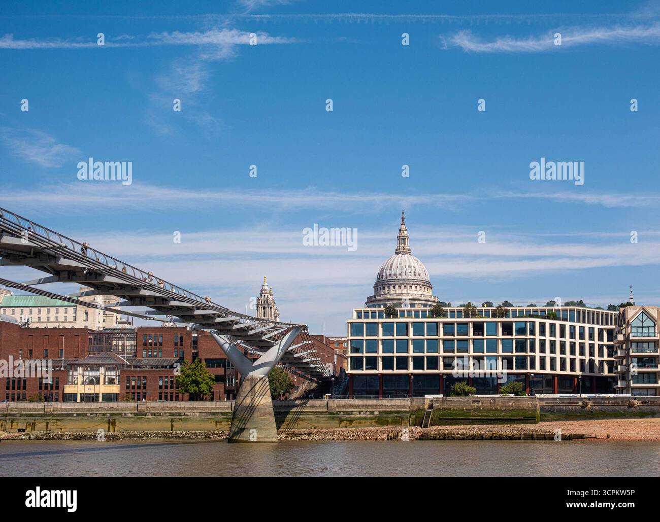 LONDON, ENGLAND - Aug 28, 2025: Hungerford Bridge crosses the River ...