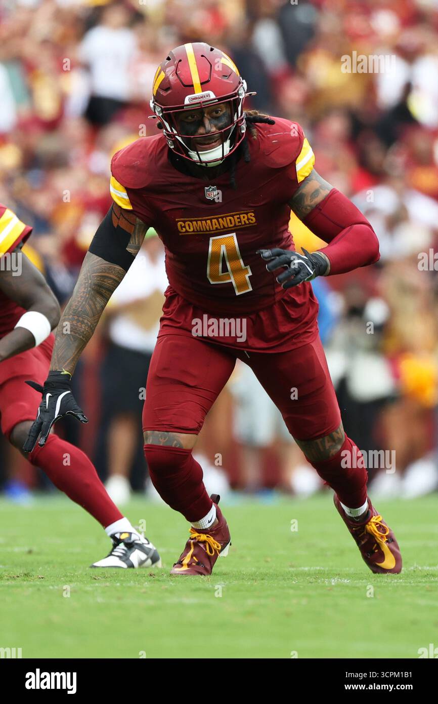 Washington Commanders linebacker Frankie Luvu (4) rushes during an NFL ...