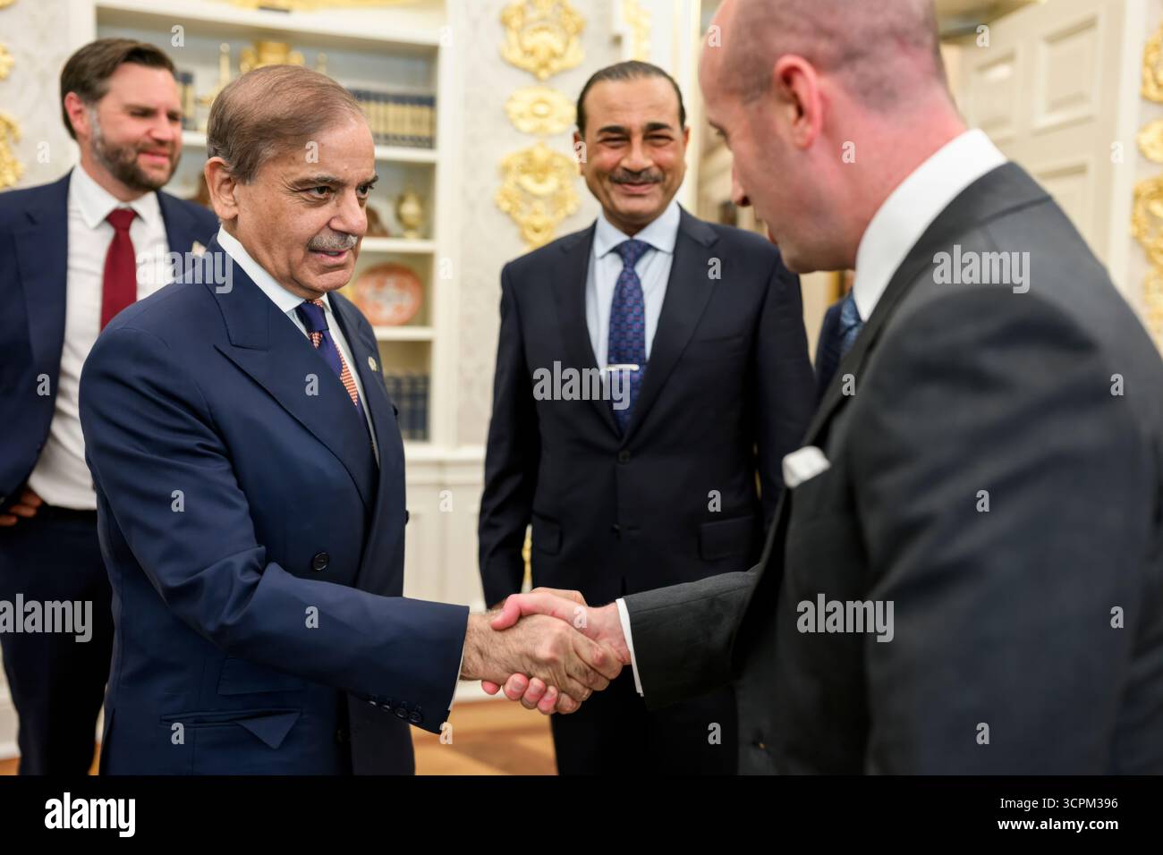 Prime Minister Shehbaz Sharif of Pakistan shakes hands with Deputy ...