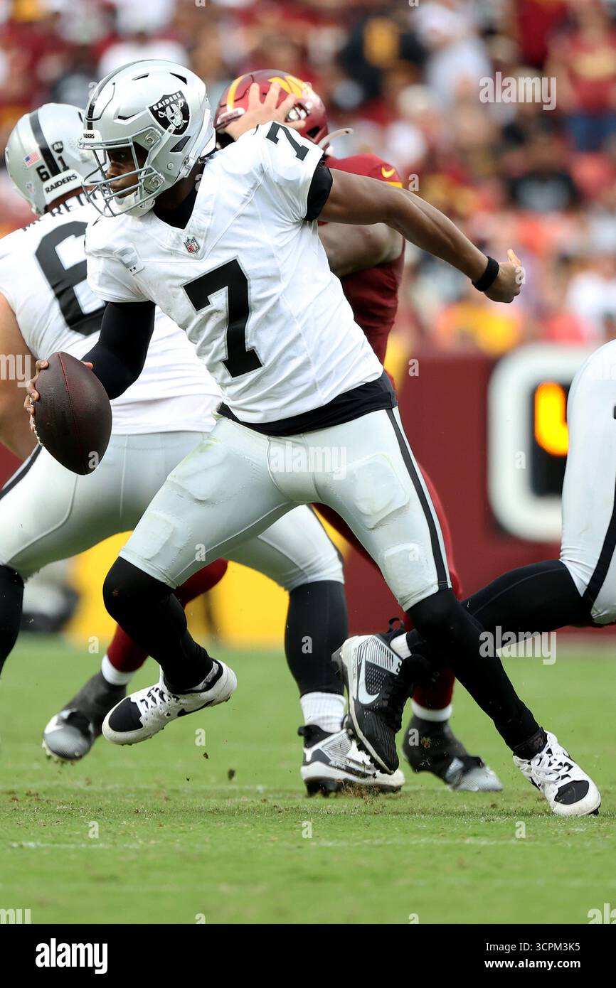 Las Vegas Raiders quarterback Geno Smith (7) runs with the ball during ...