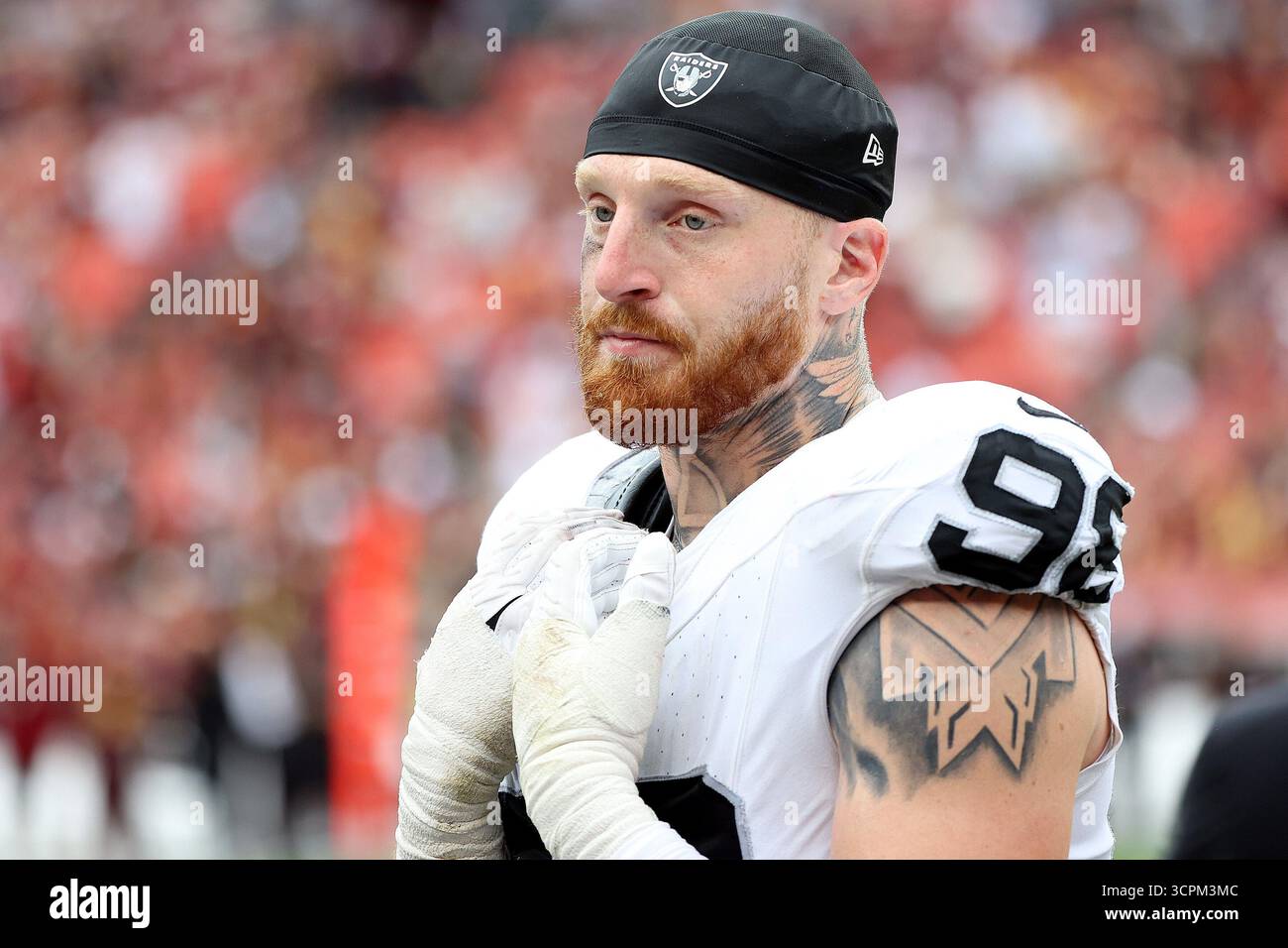 Las Vegas Raiders defensive end Maxx Crosby (98) looks on during an NFL ...