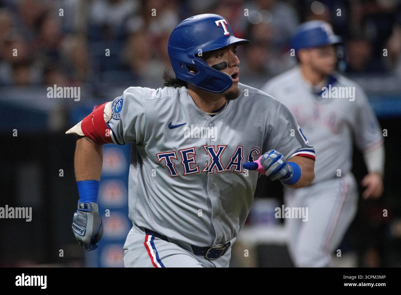 Texas Rangers' Alejandro Osuna watches his three-run home run off ...