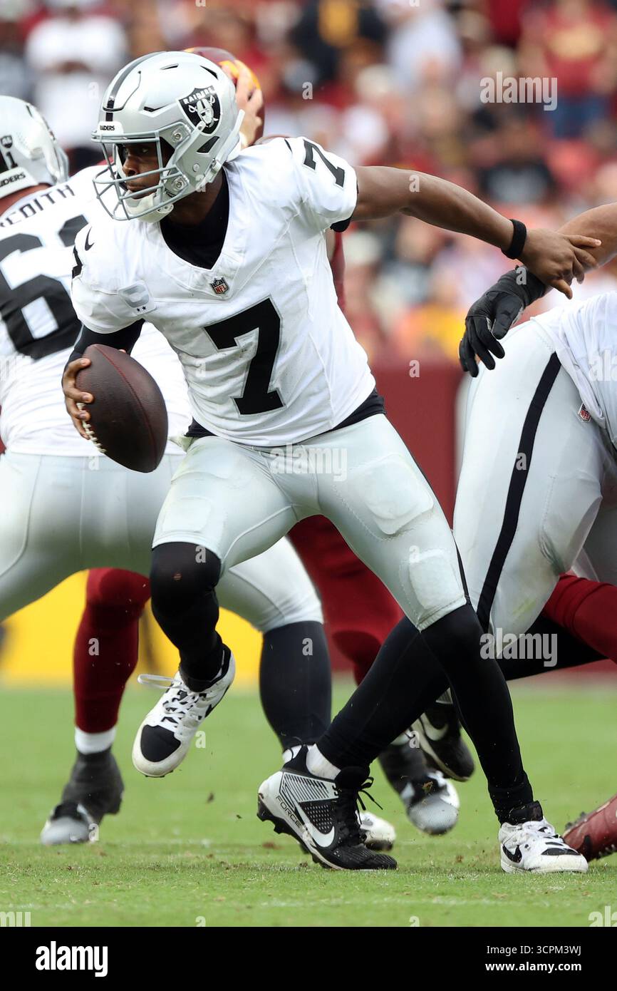 Las Vegas Raiders quarterback Geno Smith (7) runs with the ball during ...